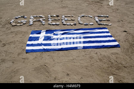 Greece written in pebbles at Agnos Beach, Corfu Greece, next to Greek ...