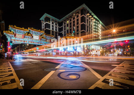 Intersection and the Chinatown Arch at night, in Washington, DC Stock ...