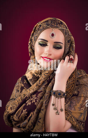 Woman wearing nice earrings looking at husband Stock Photo - Alamy