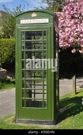 A green telephone box in Portesham, a traditional rural village in ...