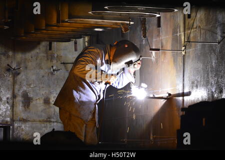 Welder in action. Series Stock Photo - Alamy