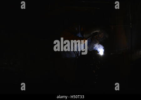 Welder in action. Series Stock Photo - Alamy