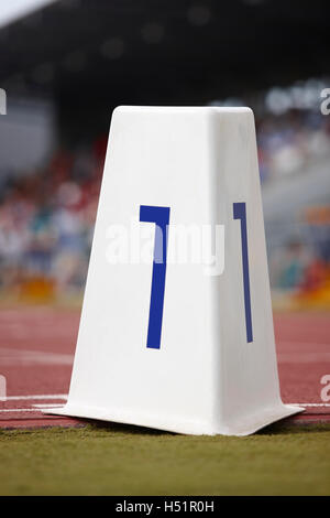 Number one signpost in an athletic running track. Vertical Stock Photo ...