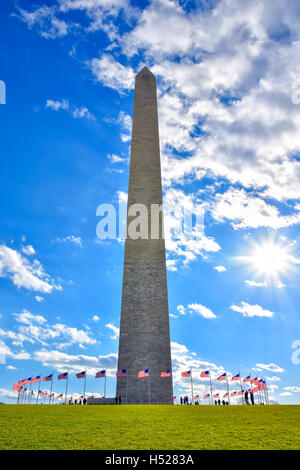 The Washington Monument, a white tower in the form of an obelisk, is ...