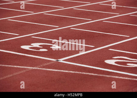 Number three signpost in an athletic running track. Vertical Stock ...