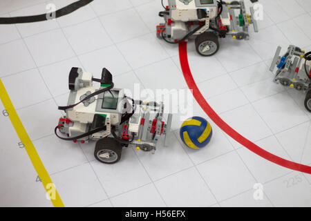 Automated machines and ball game of football Stock Photo - Alamy