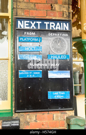 Station departure board showing next train to Westerland. Bahnhof ...