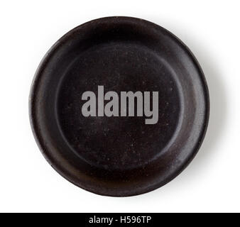 Top view of empty square plate on cement background. Empty space for ...