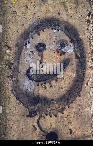 smiley face graffiti on wall Stock Photo - Alamy