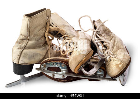 Pile of old female skates isolated on white background Stock Photo - Alamy