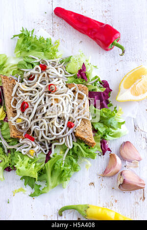 Garlic Angulas (Baby Eels) - Traditional Spanish Tapas Stock Photo - Alamy
