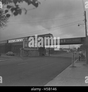 This image shows a railway train at May Pen Station in Jamaica. The ...