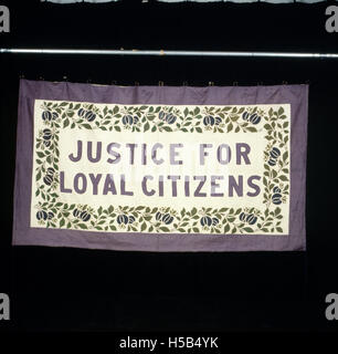The suffrage banner represents the campaign for women's right to vote ...