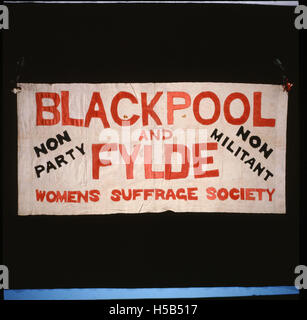 A suffrage banner displayed during the women's suffrage movement ...