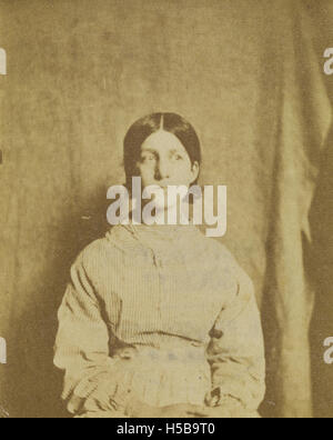 This historical portrait depicts a patient at Surrey County Asylum ...