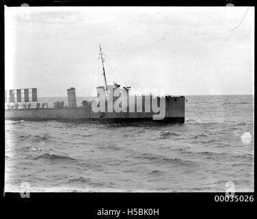 This image depicts the sinking of HMAS Torrens, captured from the I ...