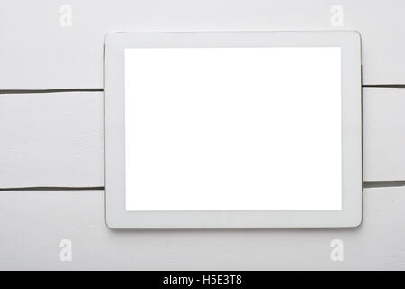 Tablet computer on boards. White screen. Top view Stock Photo - Alamy