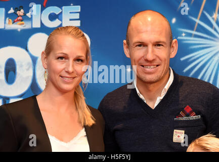 Soccer player Arjen Robben and his wife Bernadien pose in the Kaefer ...