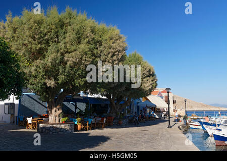 Harbour side Taverna, Village of Emborio, Chalki Island near Rhodes ...