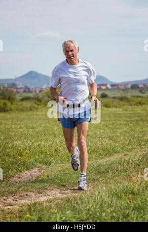 senior marathon runner Stock Photo - Alamy