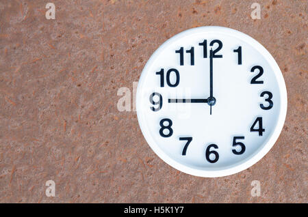 Wall clock show nine o'clock on marble texture. Office clock show 9pm ...