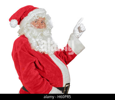 Man dressed as Santa Claus, pointing to the side with his finger, on ...