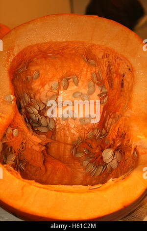 ripe pumpkins cut with seeds Stock Photo - Alamy