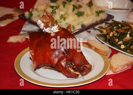 roasted pig head on the plate Stock Photo - Alamy