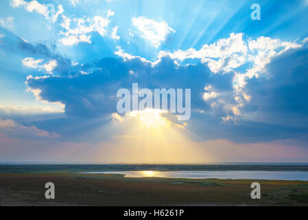 The rays of the sun at sunset, Sakhalin Island, Russia Stock Photo - Alamy