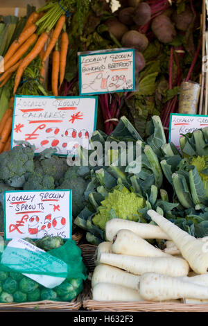 Containers of fresh organic green Brussels sprouts at the farmers ...