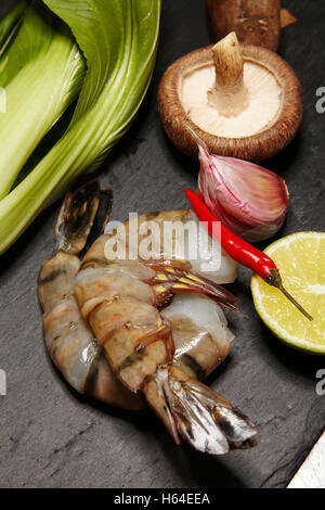 Ingredients for Asian style prawn burger with pak choi, soy sprouts ...