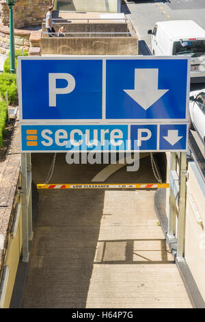 Australian car parking sign with arrow and direction on a blue ...