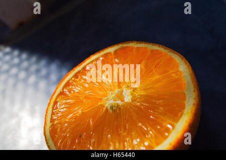 a fresh orange halve's side by side closeup, oranges cut in half Stock ...
