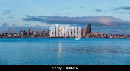 The sun reflects from buildings in the skyline of Seattle, Washington ...