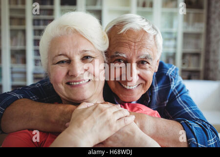 Portrait of senior couple embracing each other Stock Photo - Alamy