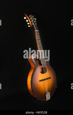 Mandolin on black backgroun, front view Stock Photo - Alamy