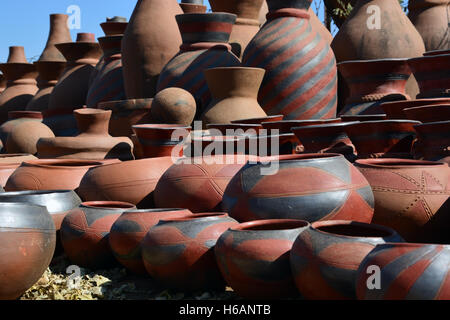 Clay pots made at the Mukondeni Pottery Factory are available for sale ...