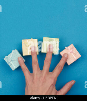 Small gift boxes of different colors. Selective focus Stock Photo - Alamy
