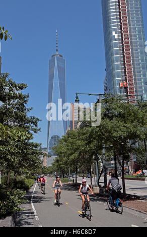 Hudson River Greenway and cyclists with One WTC view in New York City ...