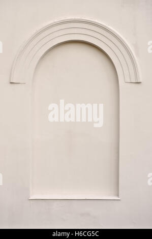 Old aged plastered faux arch false fake window stucco frame, vertical ...
