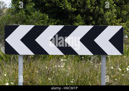 Left bend ahead road traffic sign U.K Stock Photo - Alamy