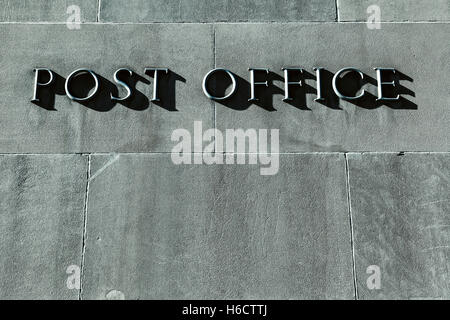 Letters on a wall depict it is the Post Office Stock Photo - Alamy
