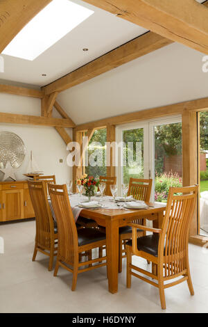 Rear of house green oak extension Stock Photo - Alamy