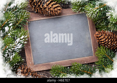 Christmas fir tree and chalkboard. Top view flat lay with space for ...
