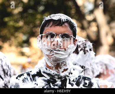 Students take part in a foam fight known as Raisin Monday on Lower ...