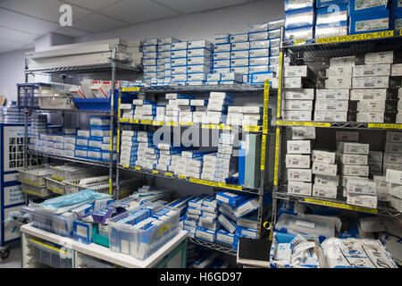 Nurse cleaning medical equipment in hospital Stock Photo - Alamy