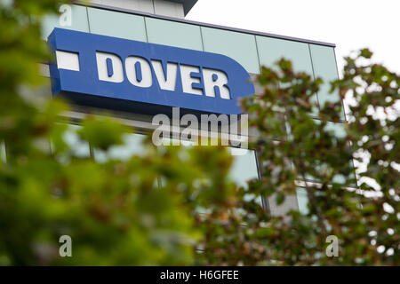 A logo sign outside of the headquarters of the Dover Corporation in ...