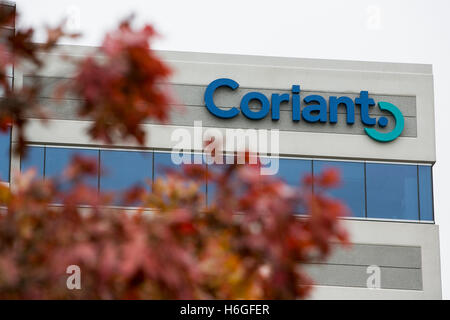 A logo sign outside of the headquarters of Coriant in Naperville ...