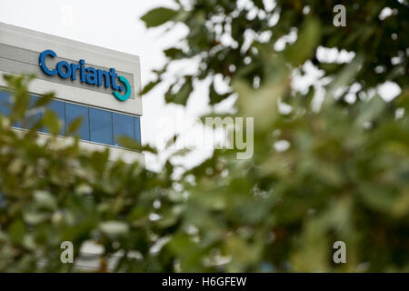 A logo sign outside of the headquarters of Coriant in Naperville ...