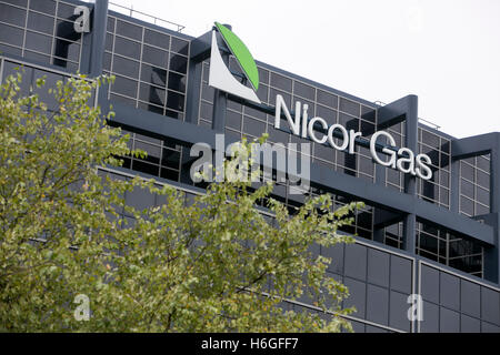 A logo sign outside of the headquarters of Nicor Gas in Naperville ...